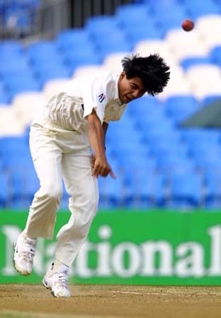 Sami delivers a ball during his second innings haul of 5-36 ...