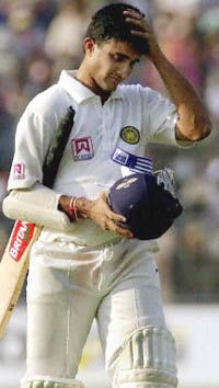 A despondent Ganguly trudges off after falling cheaply again ...