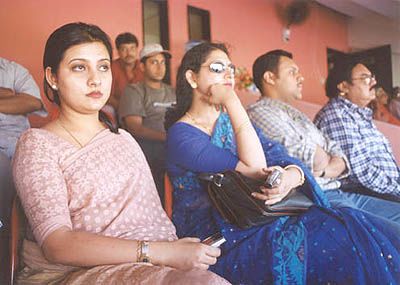 Mrs.Saurav Ganguly takes a keen interest in the proceedings ...