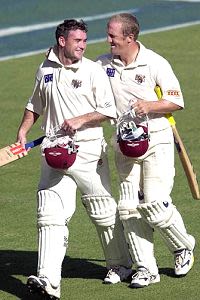 Jimmy Maher and Clinton Perren celebrate a Queensland win ...