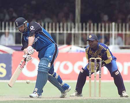 Mark Ealham prods forward at a delivery | ESPNcricinfo.com
