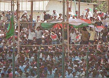 A section of the exuberent crowd with the Indian flag | ESPNcricinfo.com