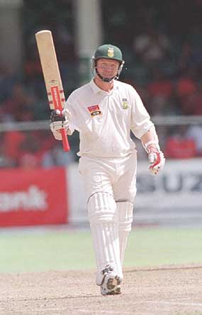 Cullinan raises his bat to acknowledge his century | ESPNcricinfo.com
