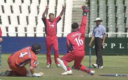 Gavin Hamilton is run out by Hegg ( wearing Crawley's shirt ...