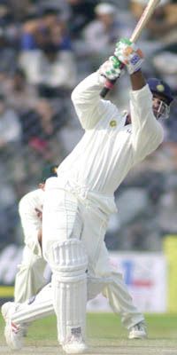 Ganguly plays a lofted on drive for six off Grant Flower | ESPNcricinfo.com