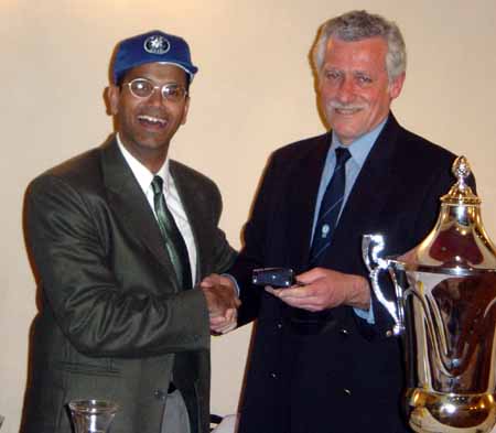 First Secretary of the Indian Embassy, Mr. Das, is presented with an ...