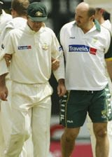 Ricky Ponting leaves the field with Alex Kountouri | ESPNcricinfo.com