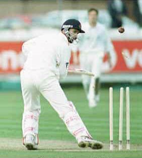 John Crawley plays the ball on to his stumps | ESPNcricinfo.com