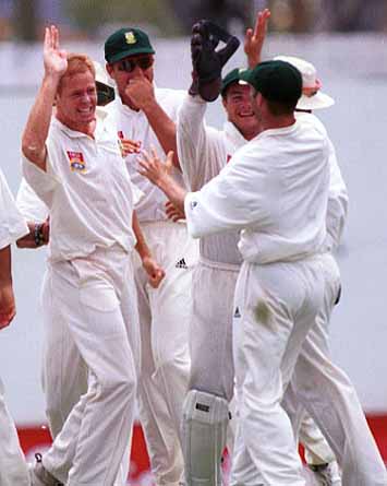 Pollock leads the South Africa celebrations on the wicket of Neil ...