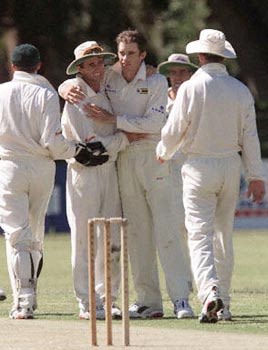 Brian Murphy is greeted by teammates after removing Javed Omar ...