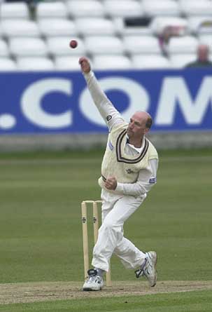 Kim Barnett plying his leg spinners at the Riverside 2001 ...