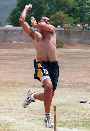 Justin Kemp warming up in the sun | ESPNcricinfo.com