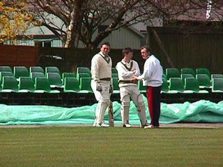 Rishton captain Peter Sleep discussing tactics with openers John Seedle ...
