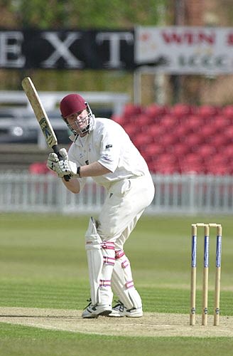James Lucas bats for his university on the 2002 season opening day ...