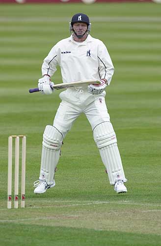 Acting Warks captain Dougie Brown warms up at the crease | ESPNcricinfo.com