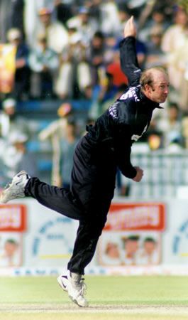 Chris Harris in his follow through | ESPNcricinfo.com