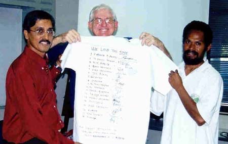 Tony Cooper (middle) at a recent umpire education seminar in Indonesia ...