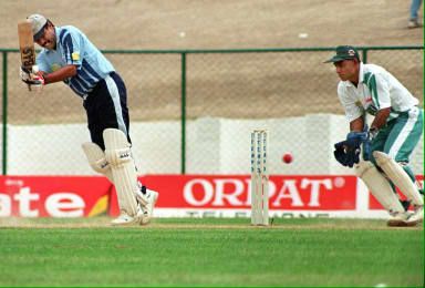 Former Indian cricketer and 1983 World Cup team member Kapil Dev (L ...