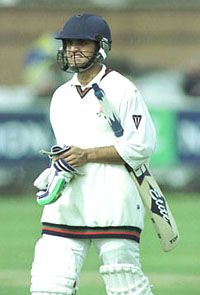 Ganguly walks back to the pavilion after being dismissed by Neil ...