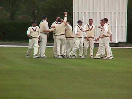 Todmorden celebrate the first ball dismissal of Clinton Perren ...