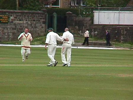 Neil Wells congratulates Clinton Perren after dismissing Nicholson ...