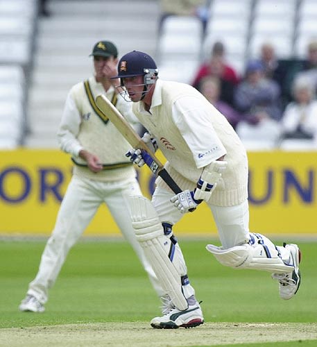 Ashley Cowan of Essex pushes off for a single in his innings of 9 ...