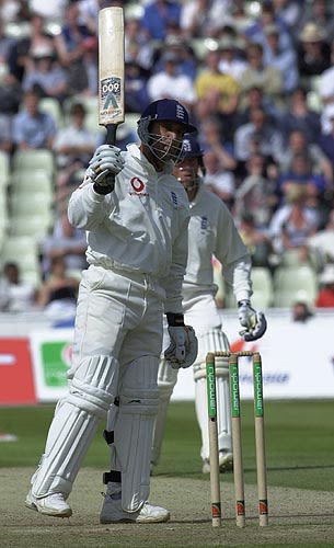 Mark Butcher proving he can get in on the act , with another Test 50 ...