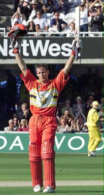 Neil Johnson celebrates his century | ESPNcricinfo.com