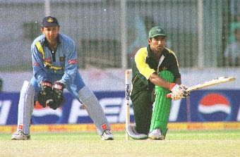 Man of the match Yousuf Youhana sweeps the the ball | ESPNcricinfo.com