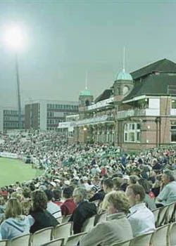 The Old Trafford pavilion basking in the glory of the flood lights ...