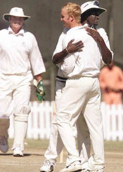 Sean Ervine and Mluleki Nkala celebrate Sameer Dighe's fall ...