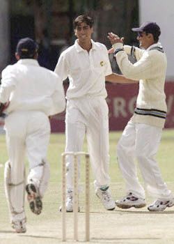 Ashish Nehra and Hemang Badani celebrate the dismissal of Andy Blignaut ...