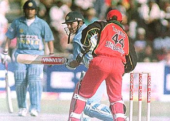 Hemang Badani gets one away to backward point during his unbeaten 52 ...