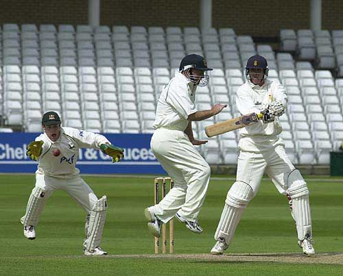 Chris Bassano sends sillymid-off Johnson into the air and keeper Read ...
