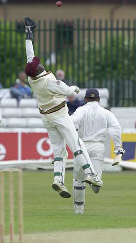 Keith Hibbert has to stretch high for this return | ESPNcricinfo.com