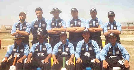 Group photo of a team playing in the first Olympia Lube Oil Cricket ...