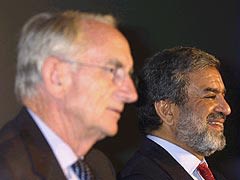 Out with the old and in with the new: Ehsan Mani (right) succeeds ...