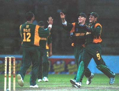 Left arm spinner Nicky Boje celebrates after take a Pakistani wicket ...