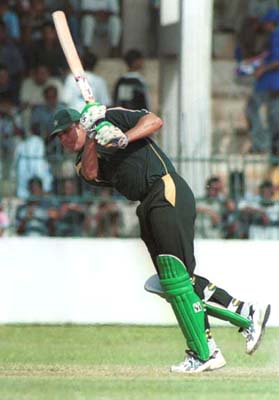 Inzamam-ul-Haq steps out to drive the ball | ESPNcricinfo.com