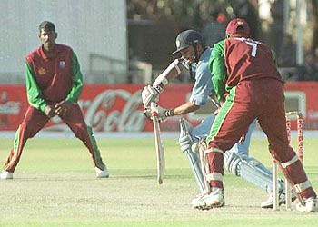 Hemang Badani opens the face of his bat to glide Nagamootoo ...