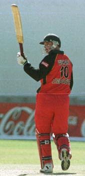 Craig Wishart raises a toast to his half century | ESPNcricinfo.com