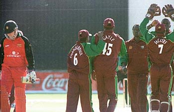 Corey Collymore collects the wicket of Stuart Carlisle | ESPNcricinfo.com