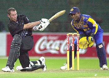 Adam Parore executes a sweep during his knock of 51 | ESPNcricinfo.com