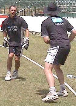 Adam Parore practises his skills with the gloves | ESPNcricinfo.com