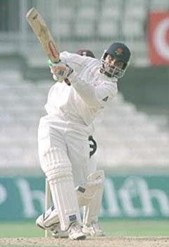 Ganguly lifts the ball over long off to collect another boundary ...