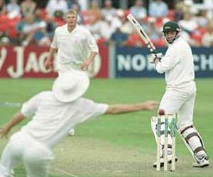 Mike Atherton is beaten by an edge from Dakin off the bowling of Andrew ...
