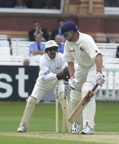 Jack Russell holds Giles to the crease with superior glove work ...