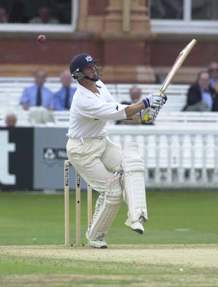 Tim Hancock with a delivery from Dougie Brown | ESPNcricinfo.com