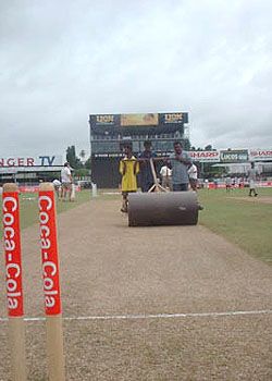 The pitch at the Sinhalese Sports Club Ground is rolled in overcast ...