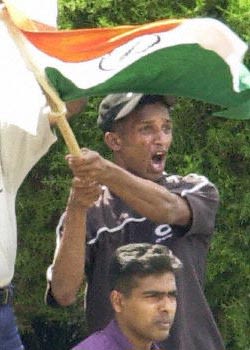 A happy Indian fan egging his team on to victory | ESPNcricinfo.com